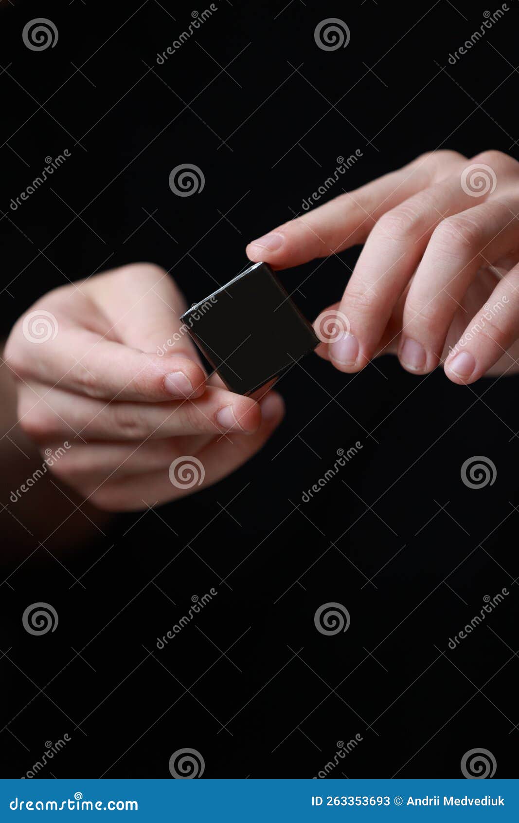 Mans Hands Holding a Square Little Black Box with an Copy Empty Space ...