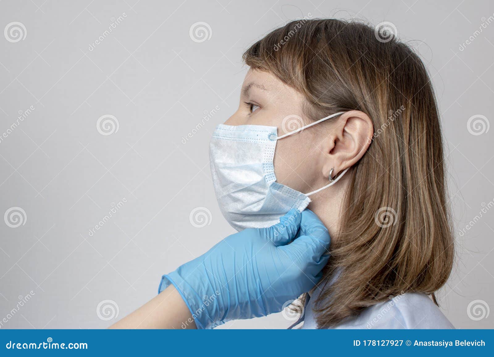 Mans Hands Puts a Protective Mask on Woman Mouth Stock Image - Image of ...