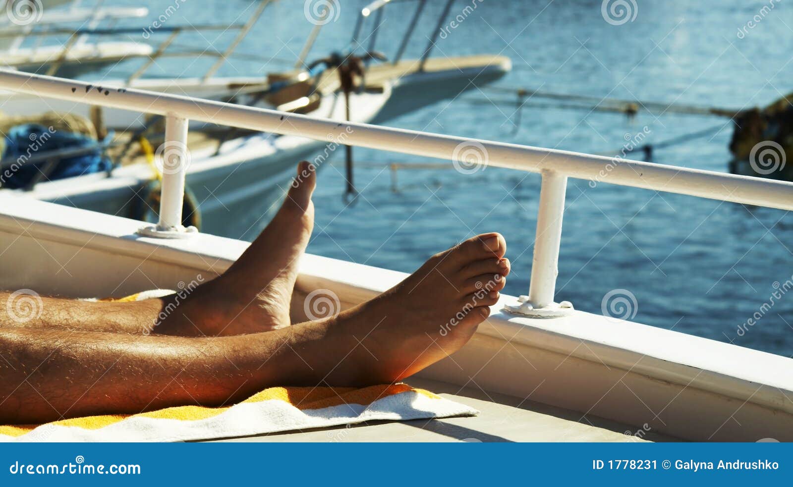 Mans legs on yacht stock image. Image of main, boat, mast - 1778231