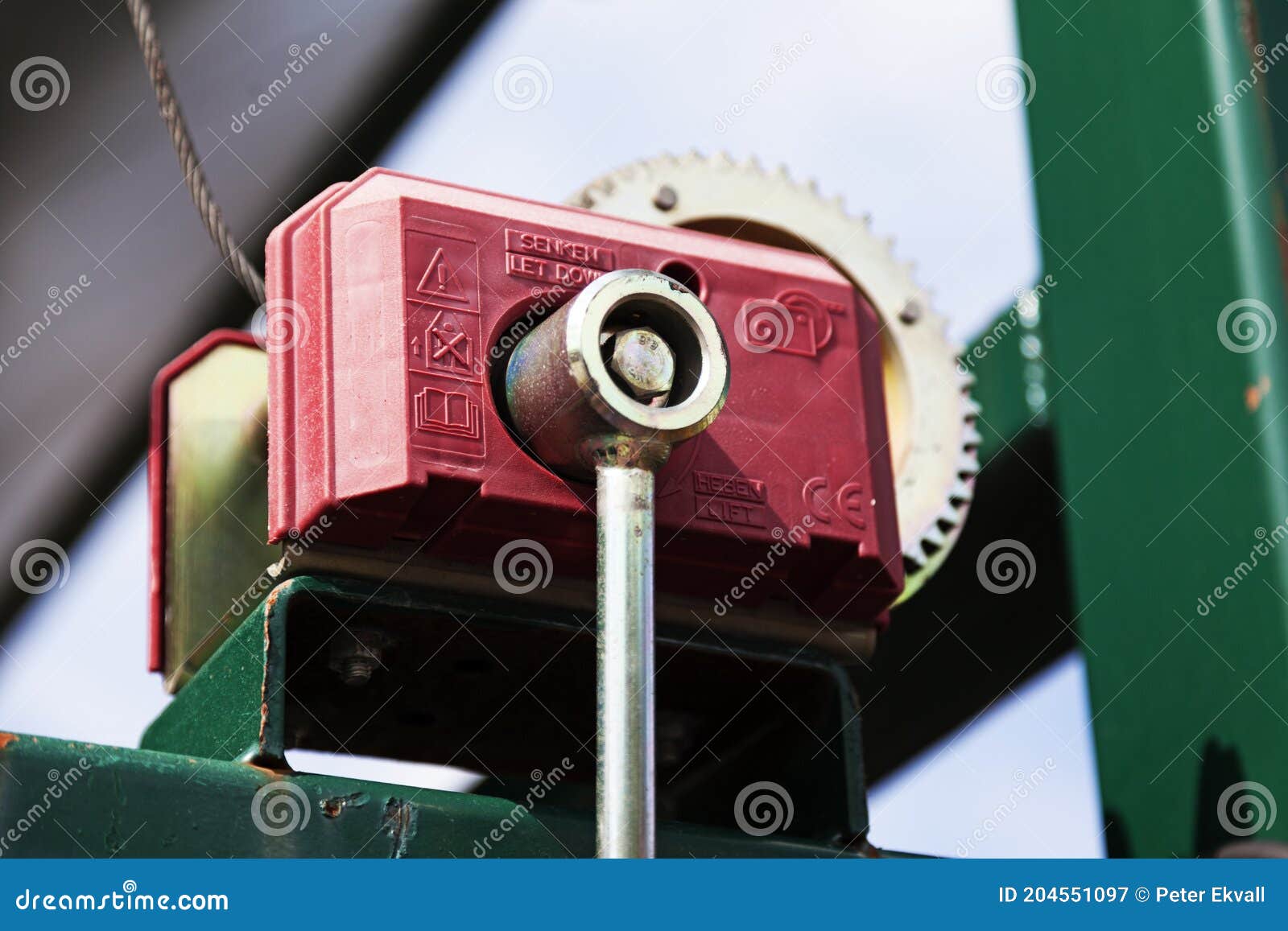 A manual crank for a lift stock image. Image of engineering - 204551097