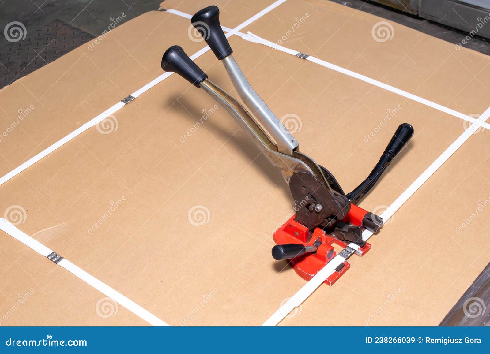 Manual Strapping of Packages for Shipping Stock Image - Image of metal ...