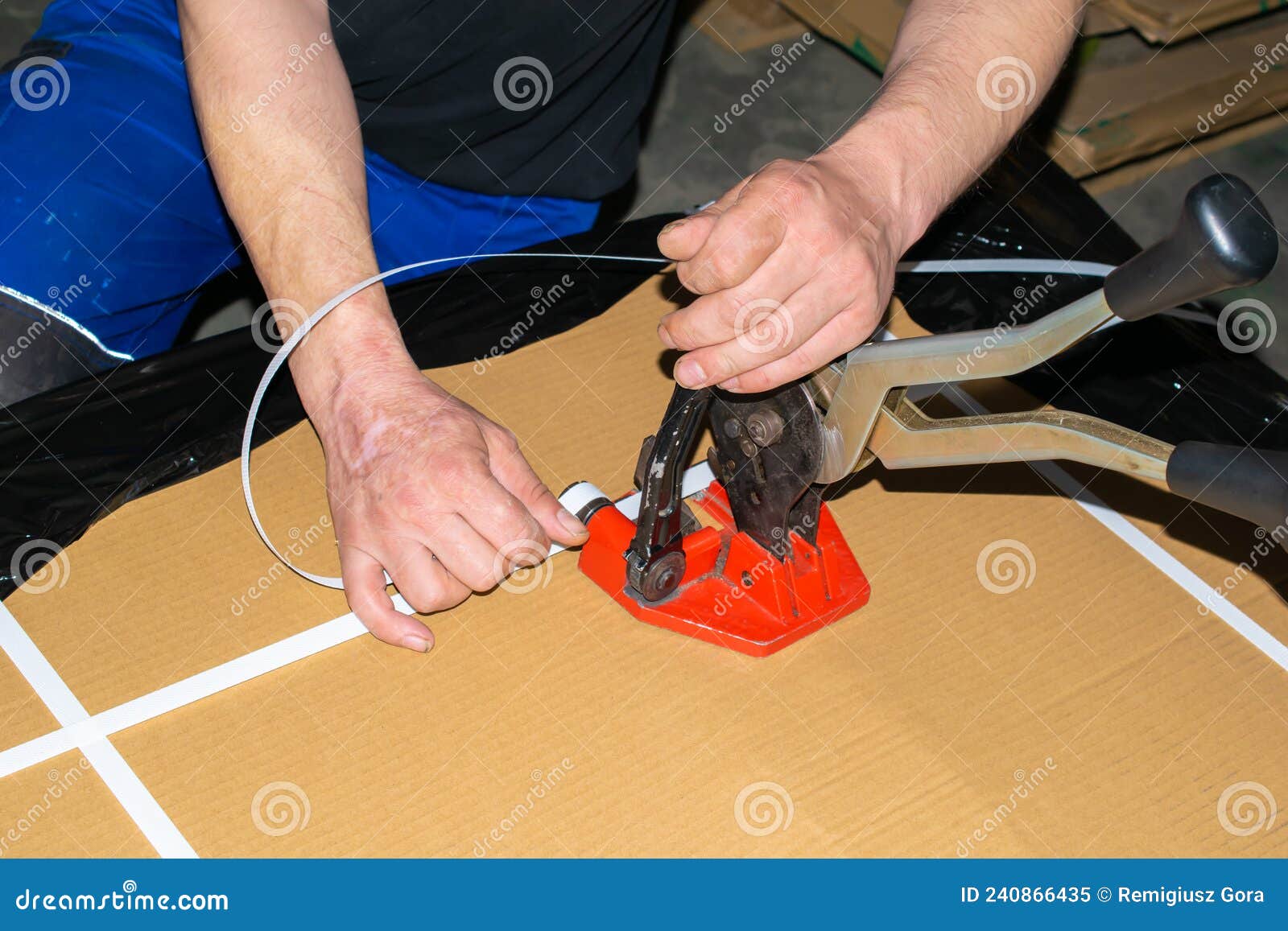 Manual Strapping of Packages for Shipping Stock Image - Image of work ...
