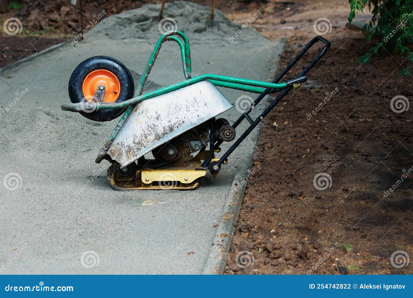 Manual Vibration Plate Compactor is Covered with a Construction ...