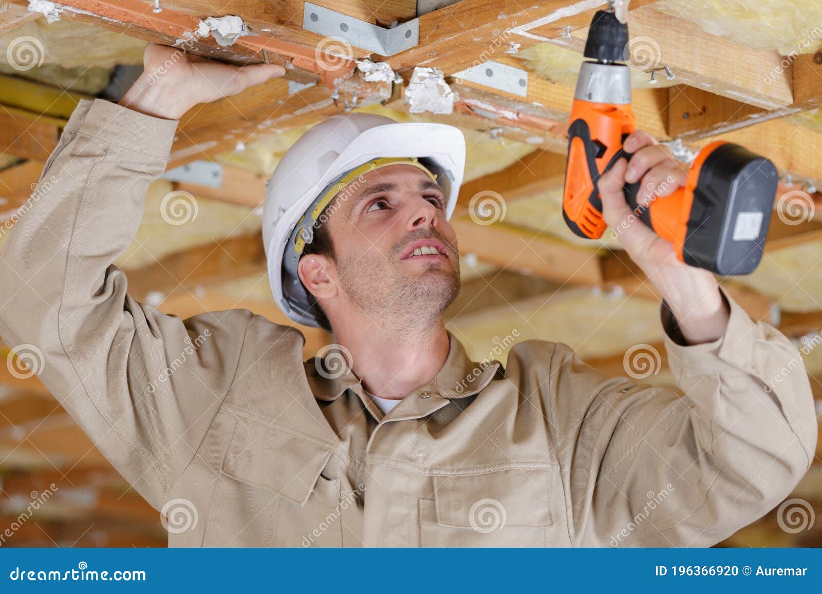 Manual Worker Drilling Ceiling with Drilling Machine Stock Photo ...