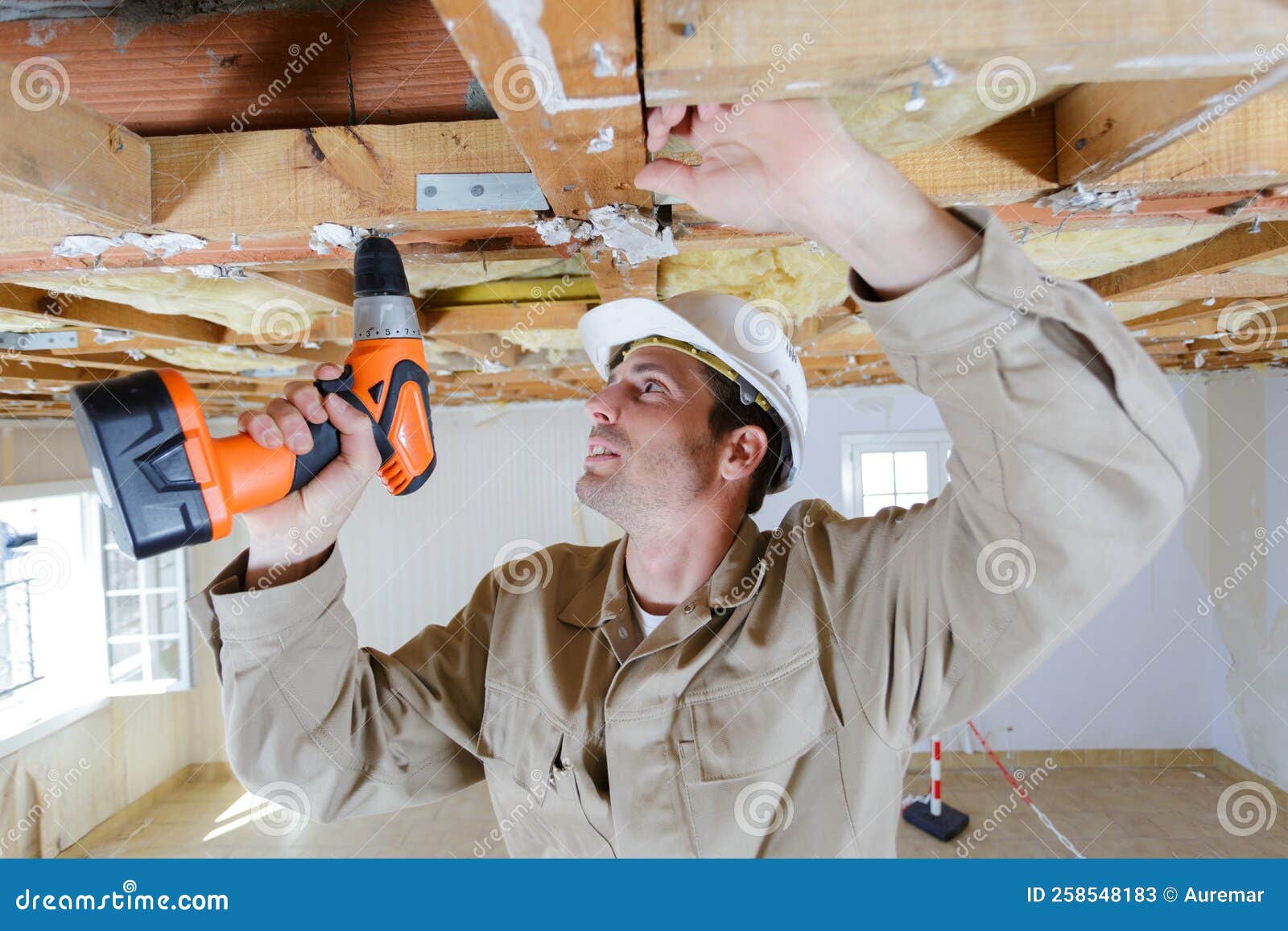 Manual Worker Drilling Ceiling with Drilling Machine Stock Image ...