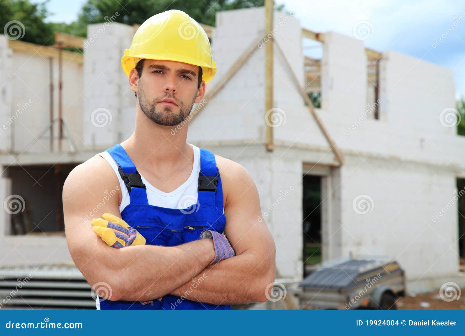 Manual Worker in Front of Construction Site Stock Photo - Image of ...