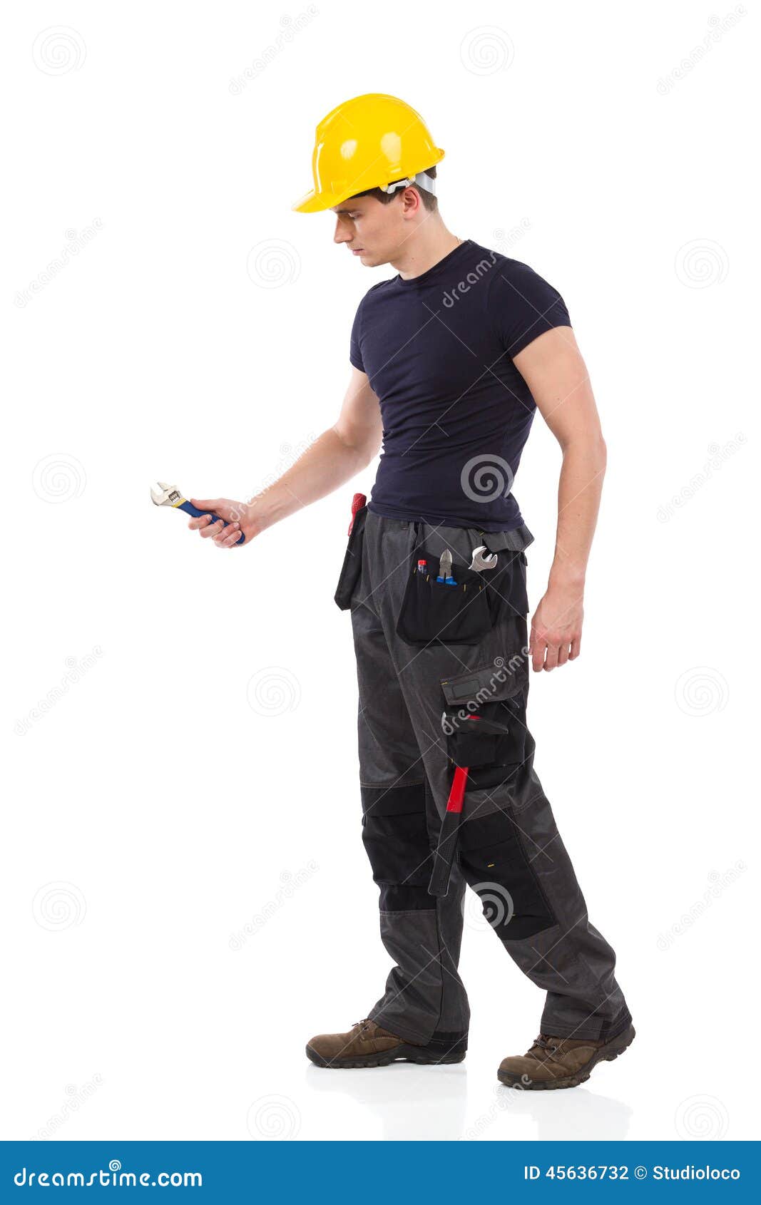 Manual Worker Using a Wrench Stock Photo - Image of hardhat ...