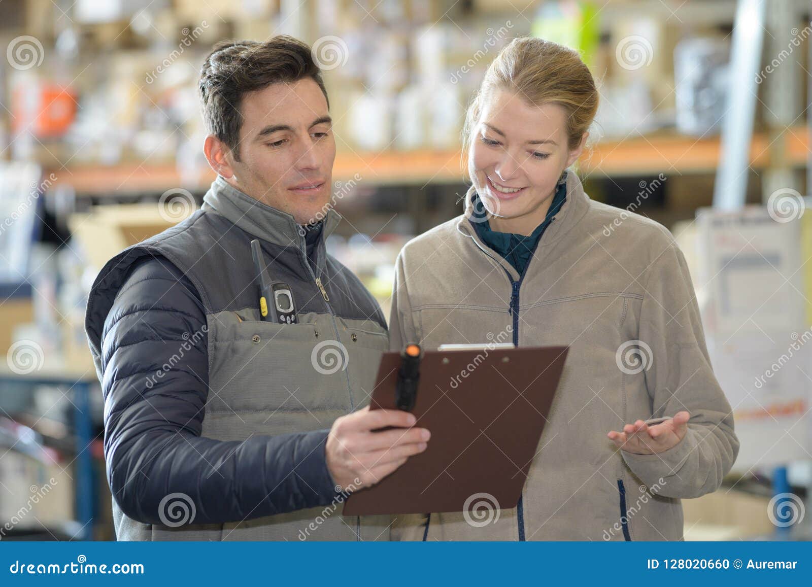 Manual Workers Checking Package in Clipboard Stock Photo - Image of ...