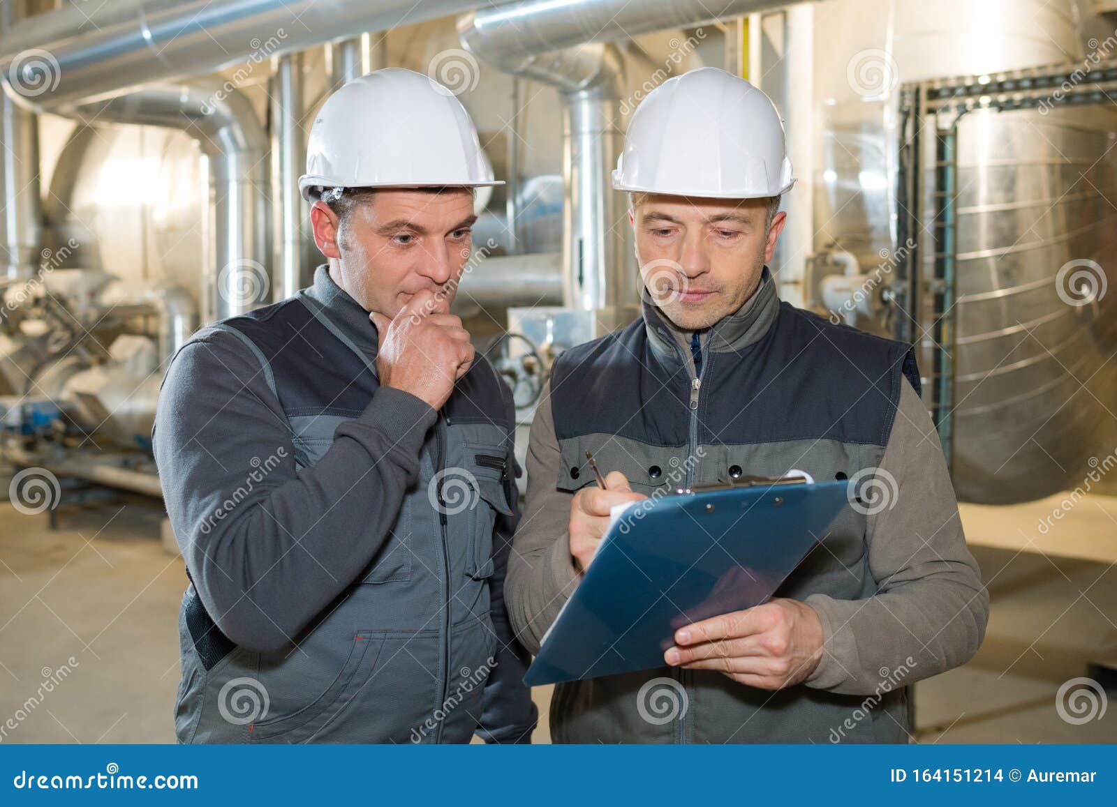 Manual Workers Working in Factory Stock Photo - Image of rack, team ...