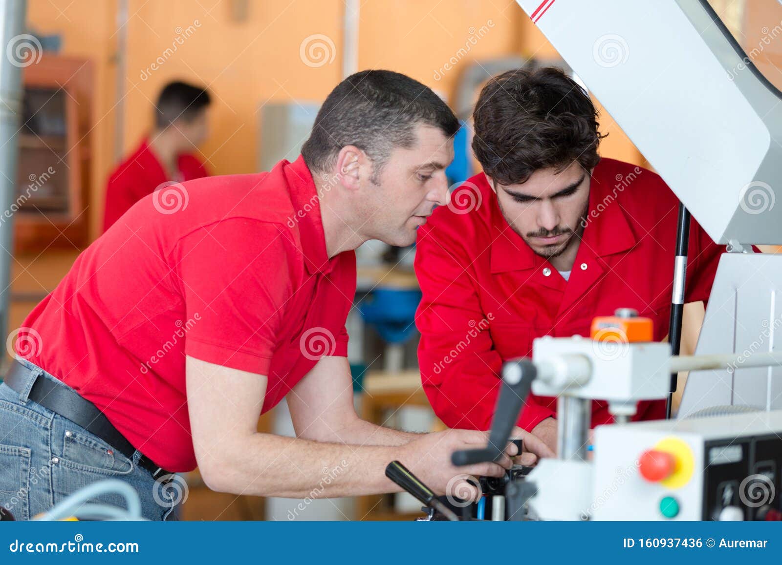 Manufacture Workers Working on Electronic Machine Stock Photo - Image ...