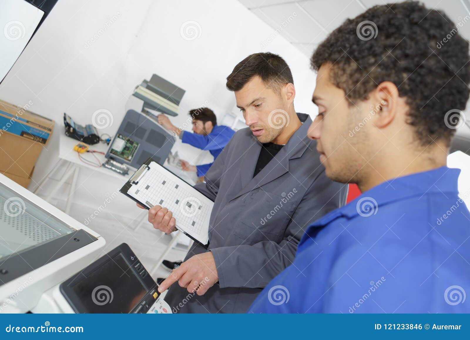 Manufacture Workers Working on Electronic Machine Stock Photo - Image ...