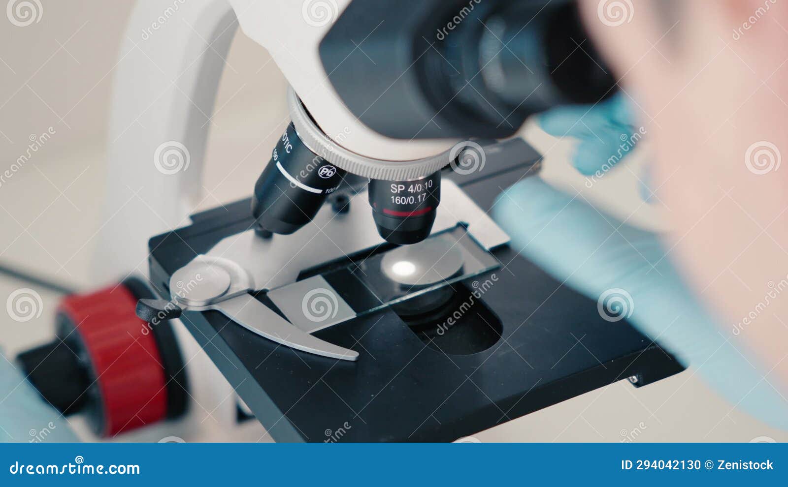 A Man Looks at a Product Under a Microscope Stock Footage - Video of ...