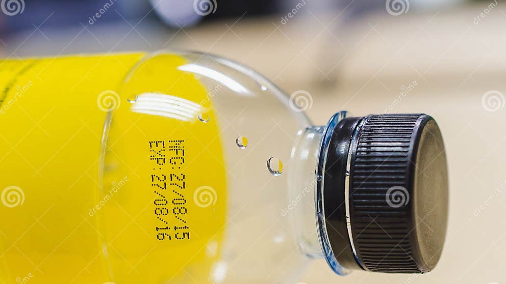 Manufacturing Date and Expiration Date on Bottle Stock Image - Image of ...