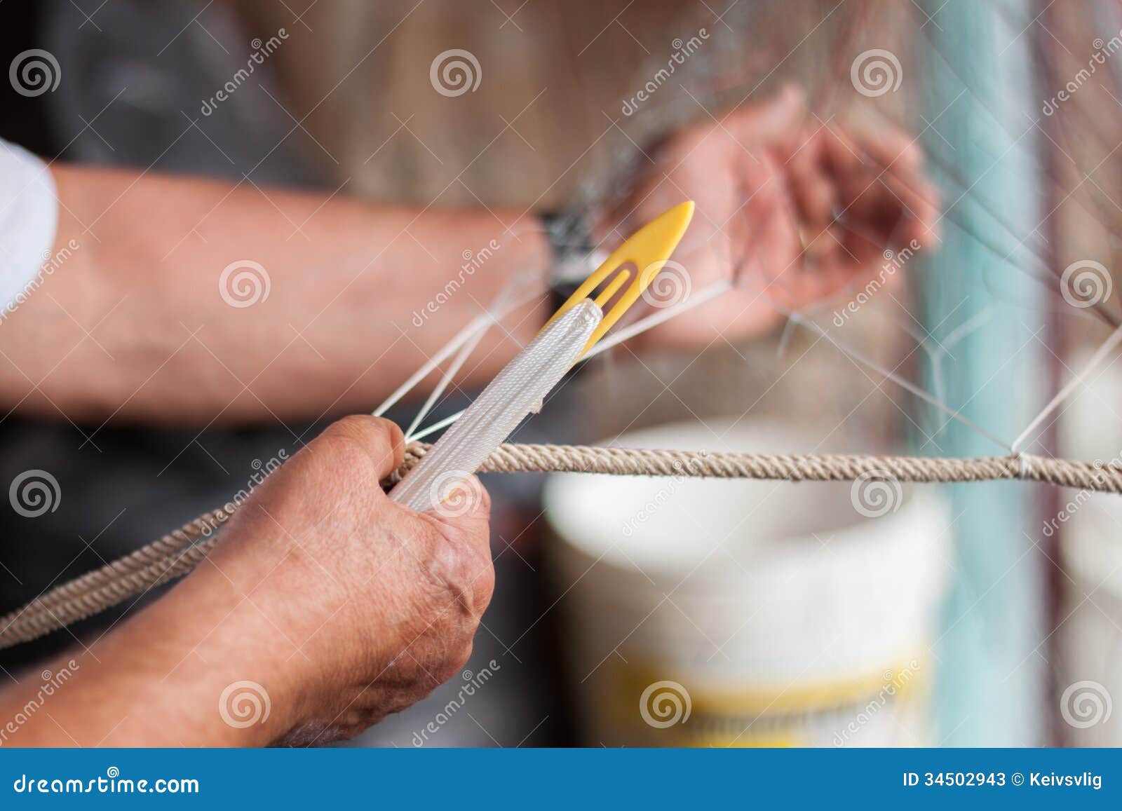 Manufacturing fishing net stock image. Image of knots - 34502943