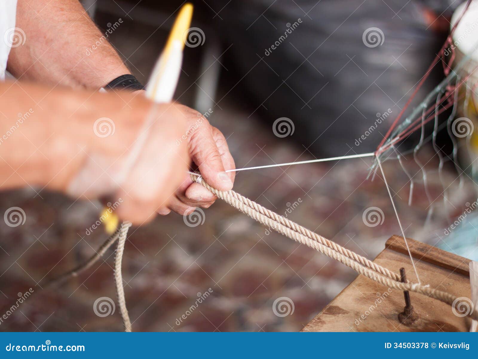 Manufacturing fishing net stock photo. Image of knot - 34503378