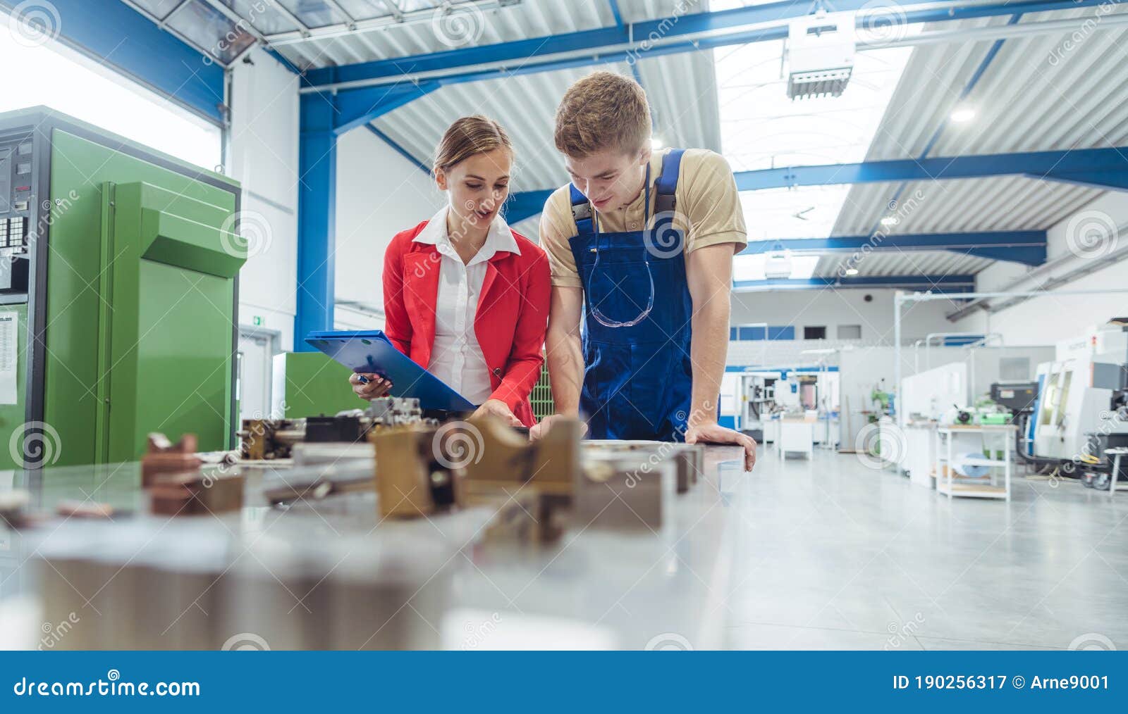 Manufacturing Worker. Asian Mechanical Engineer Operating Industrial ...