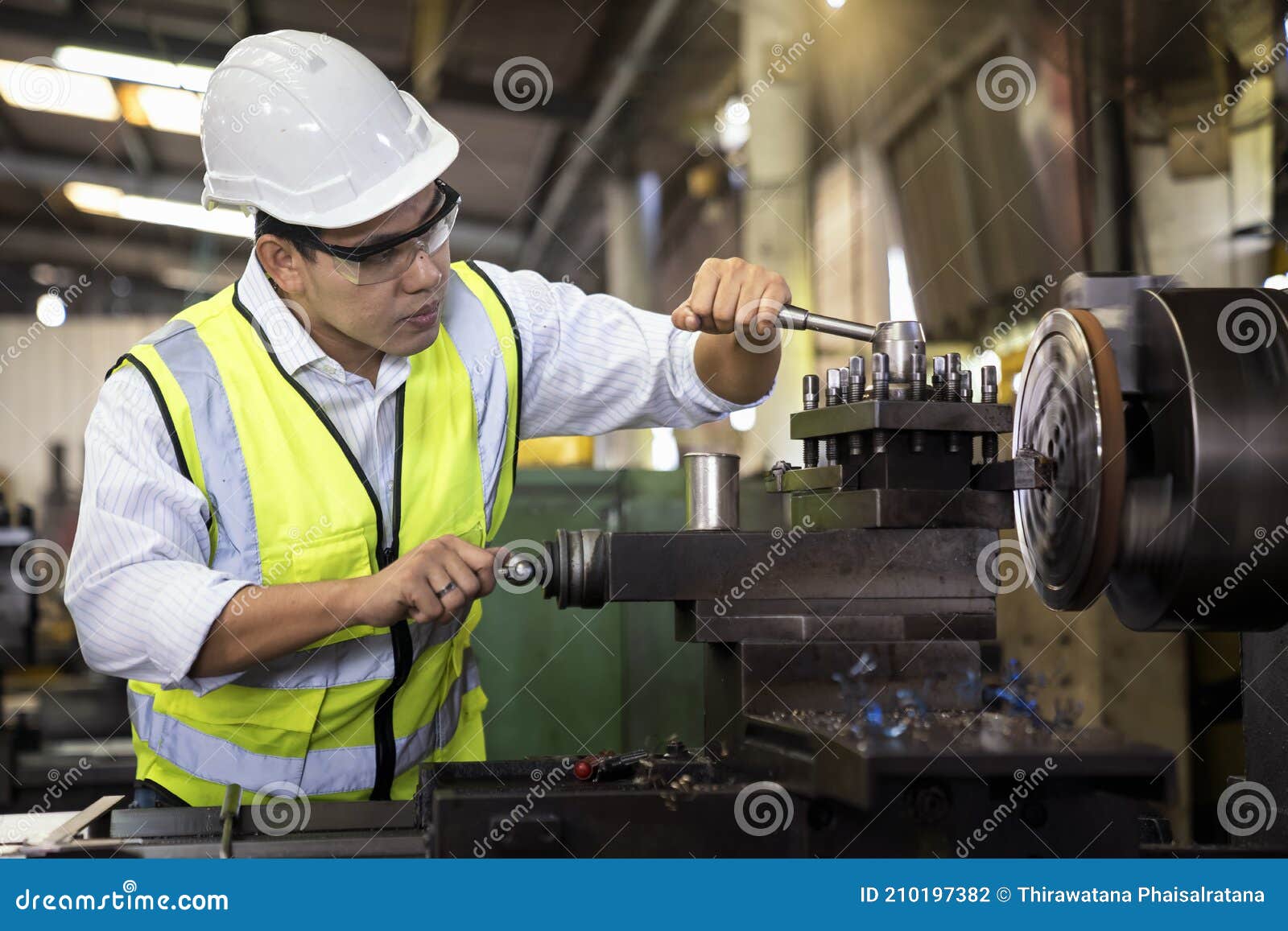 Manufacturing Worker. Mechanical Engineer Who Controls the Lathe ...