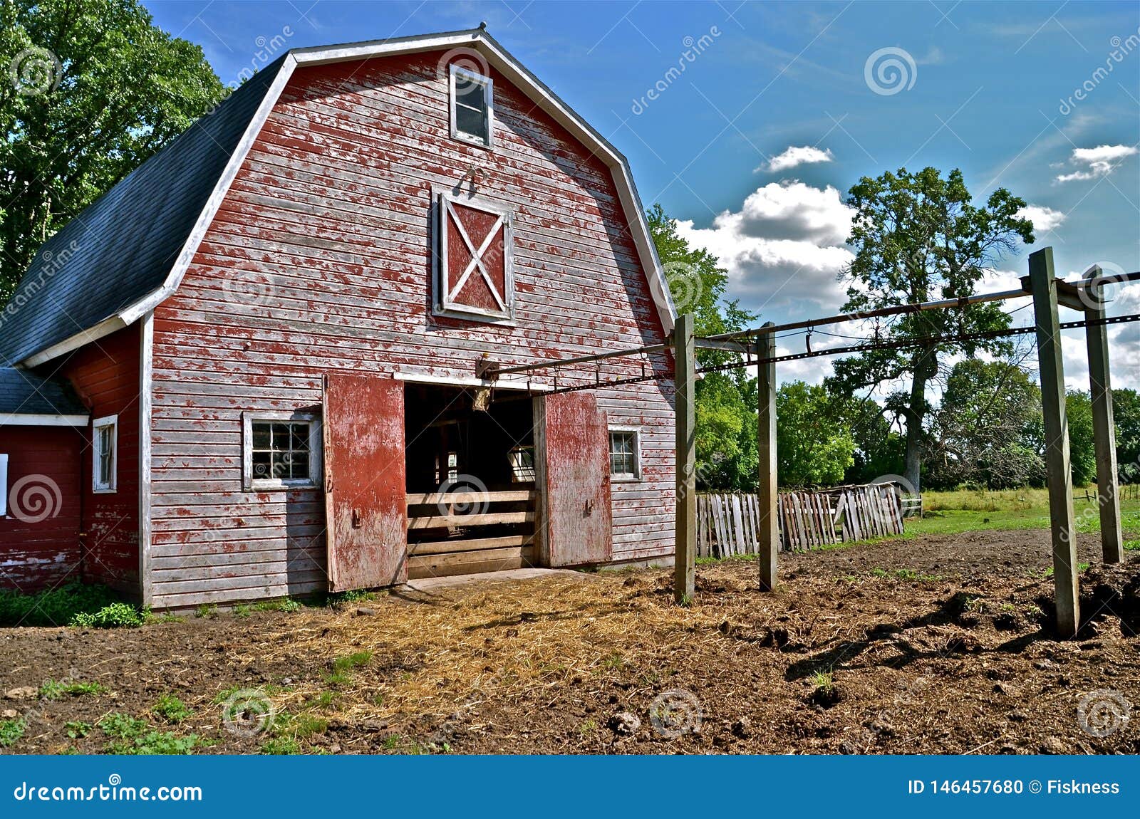 Manure Carrier on an Old Red Barn Stock Photo - Image of agriculture ...