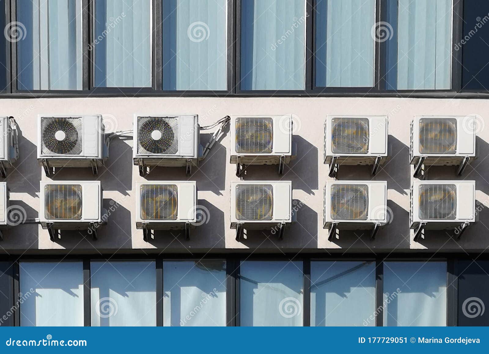 Many Air Conditioners on the Facade of an Office Building. Temperature ...