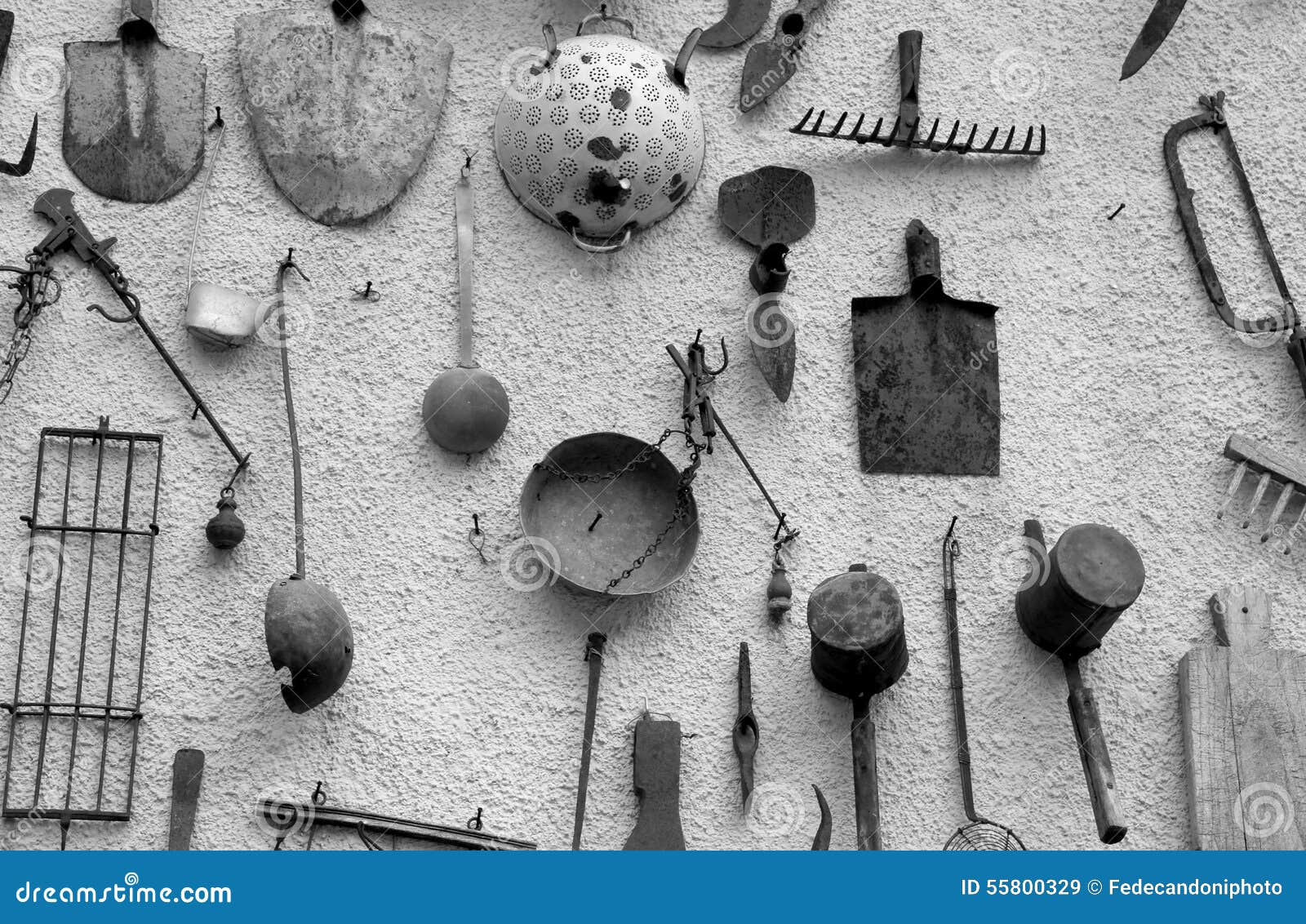 Many Ancient Farming Tools Hanging on the Wall Stock Image - Image of ...