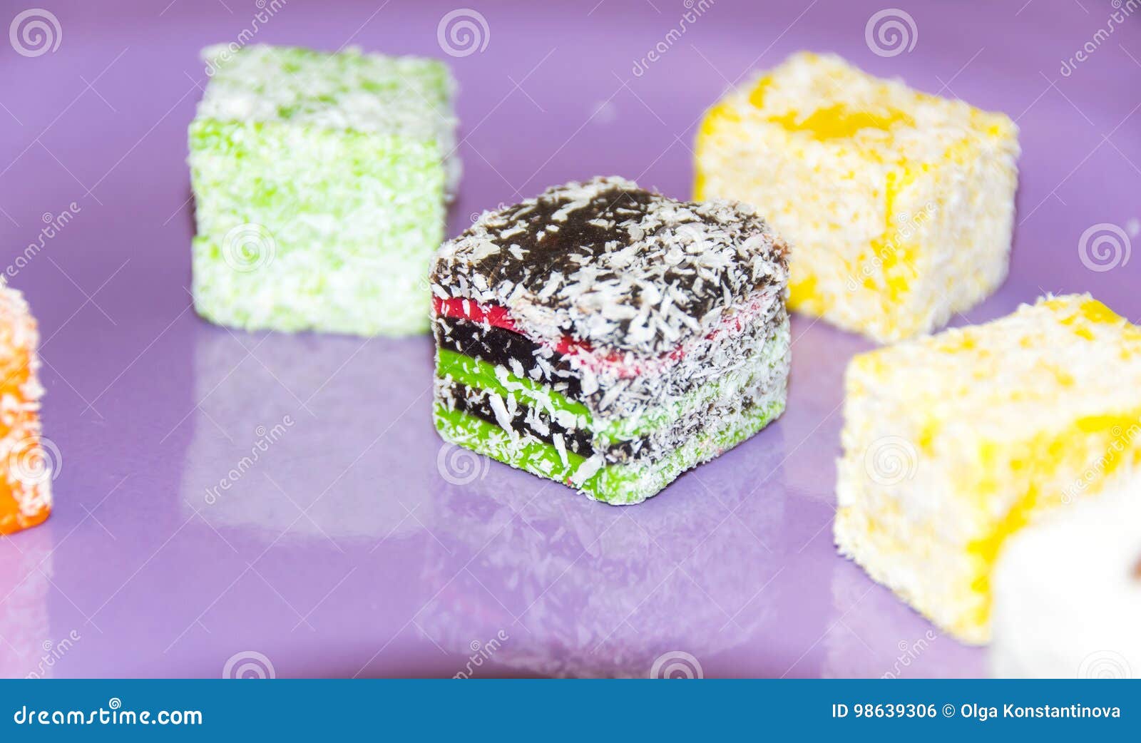 Many Assorted Multicolored Turkish Delight on Purple Background Stock ...