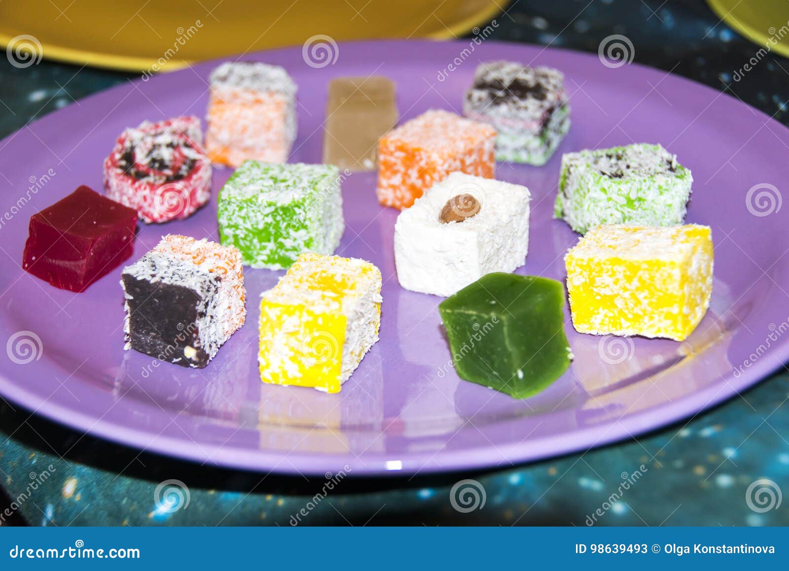Many Assorted Multicolored Turkish Delight on Purple Background Stock ...
