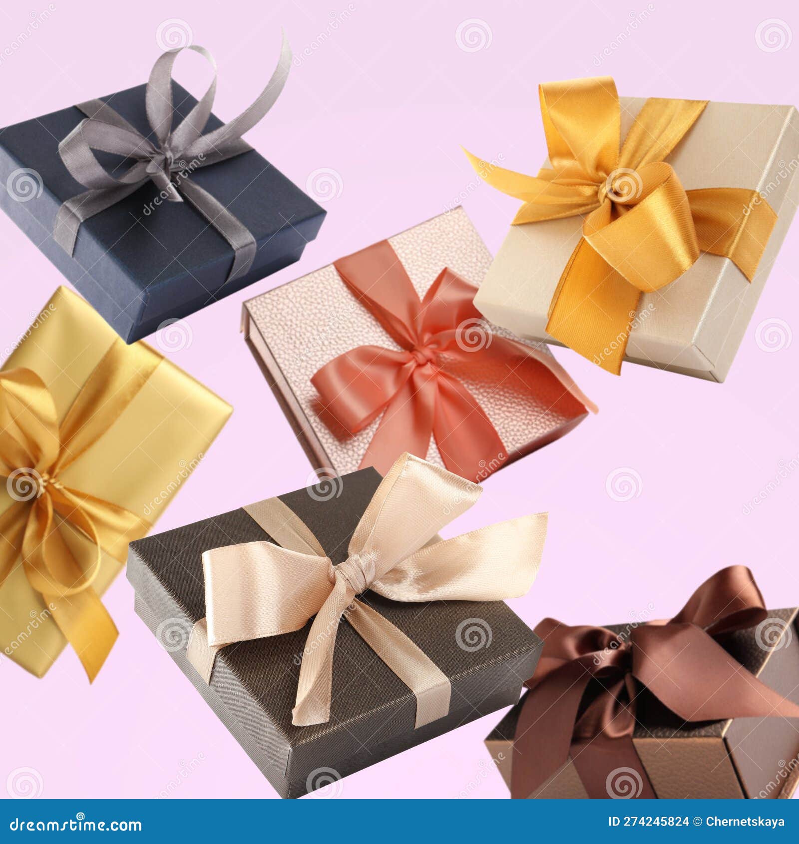 Many Beautiful Gift Boxes Falling on Pastel Pink Background Stock Photo ...