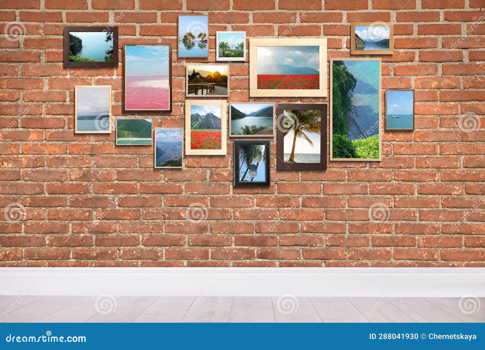 Many Beautiful Landscapes in Frames on Brick Wall in Room Stock Photo ...