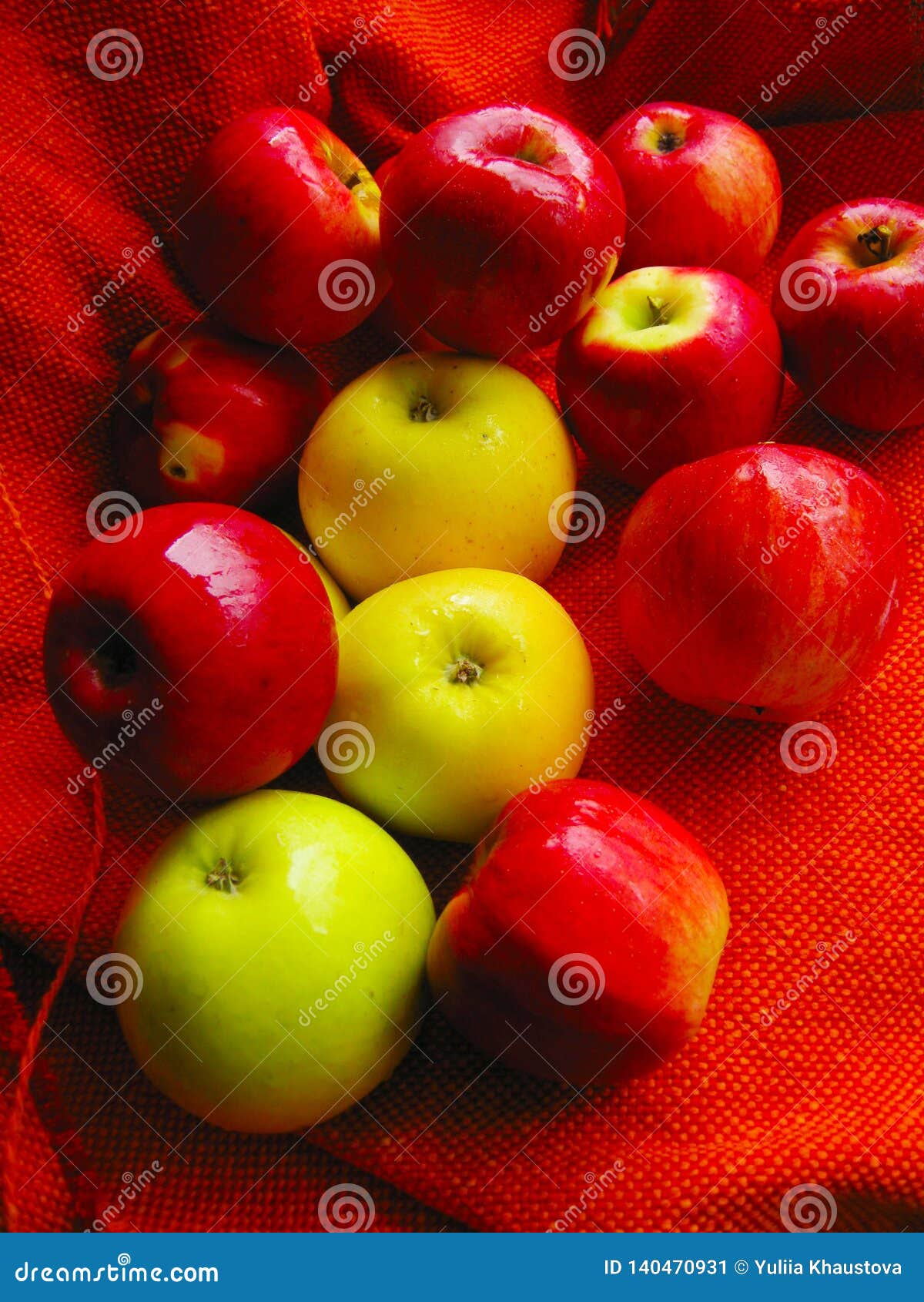 Many Beautiful Yellow and Red Apples on Orange Stock Image - Image of ...