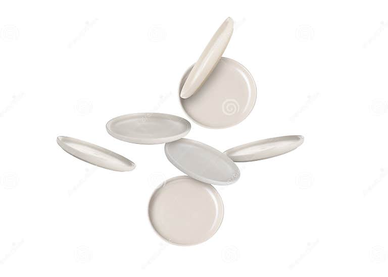 Many Beige Plates Falling on White Background Stock Photo - Image of ...