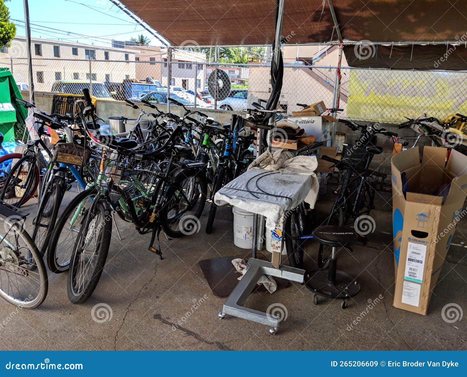 Many Bicycles under repair editorial stock image. Image of city - 265206609