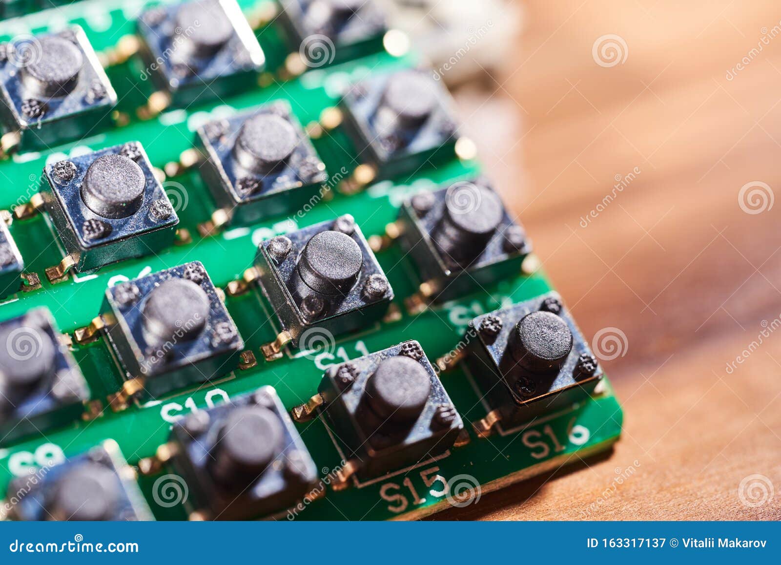 Many Black Small Buttons on a Green Printed Circuit Board Stock Image ...