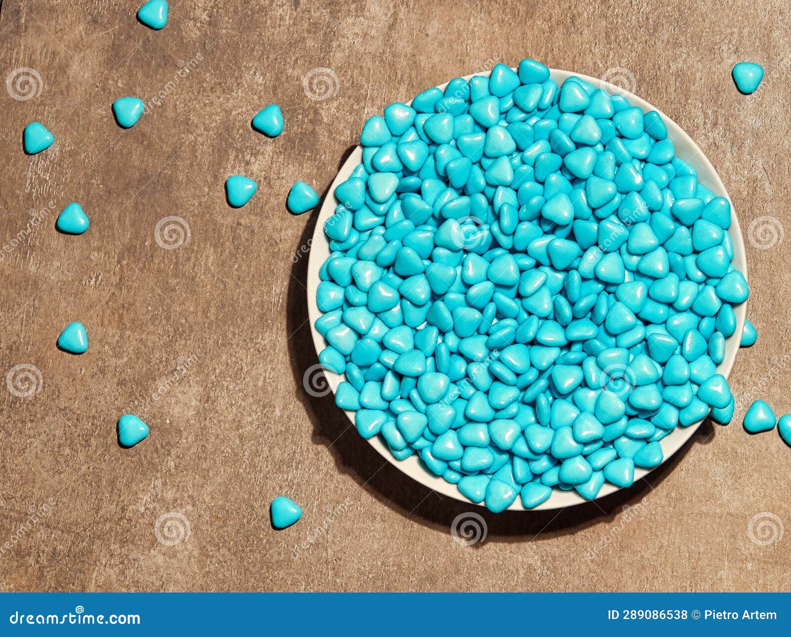 Many Blue Candies in the Shape of Hearts Stock Photo - Image of snack ...