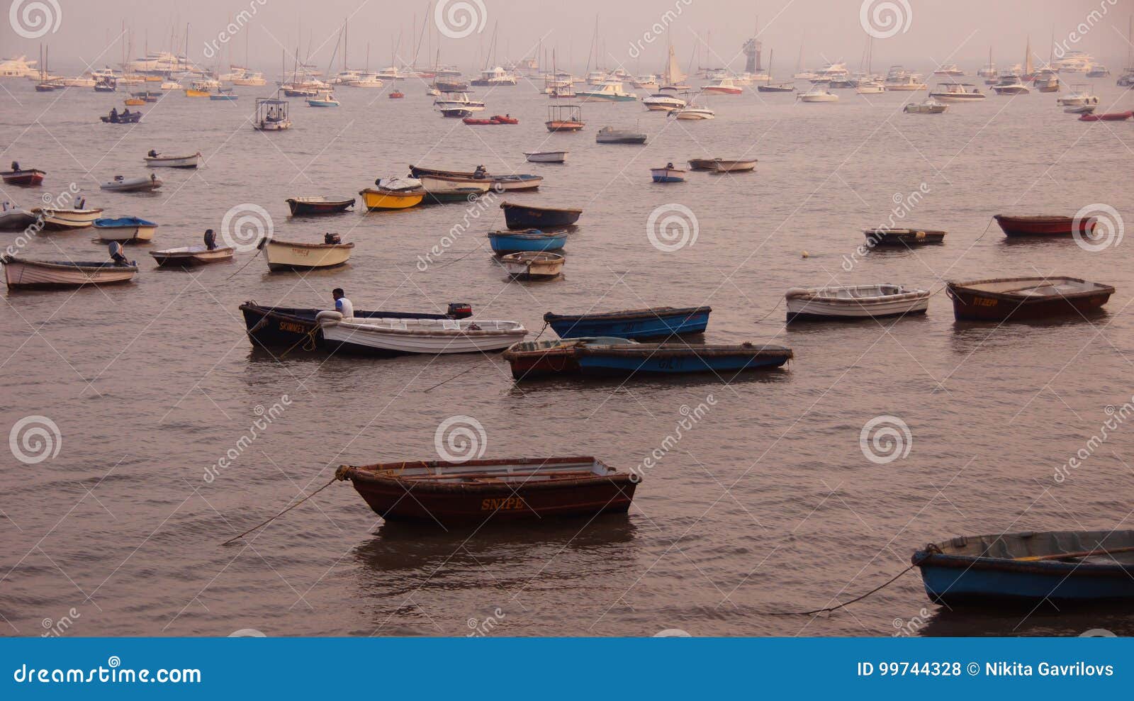 Many boats in the sea editorial stock photo. Image of boatsinthesmog ...