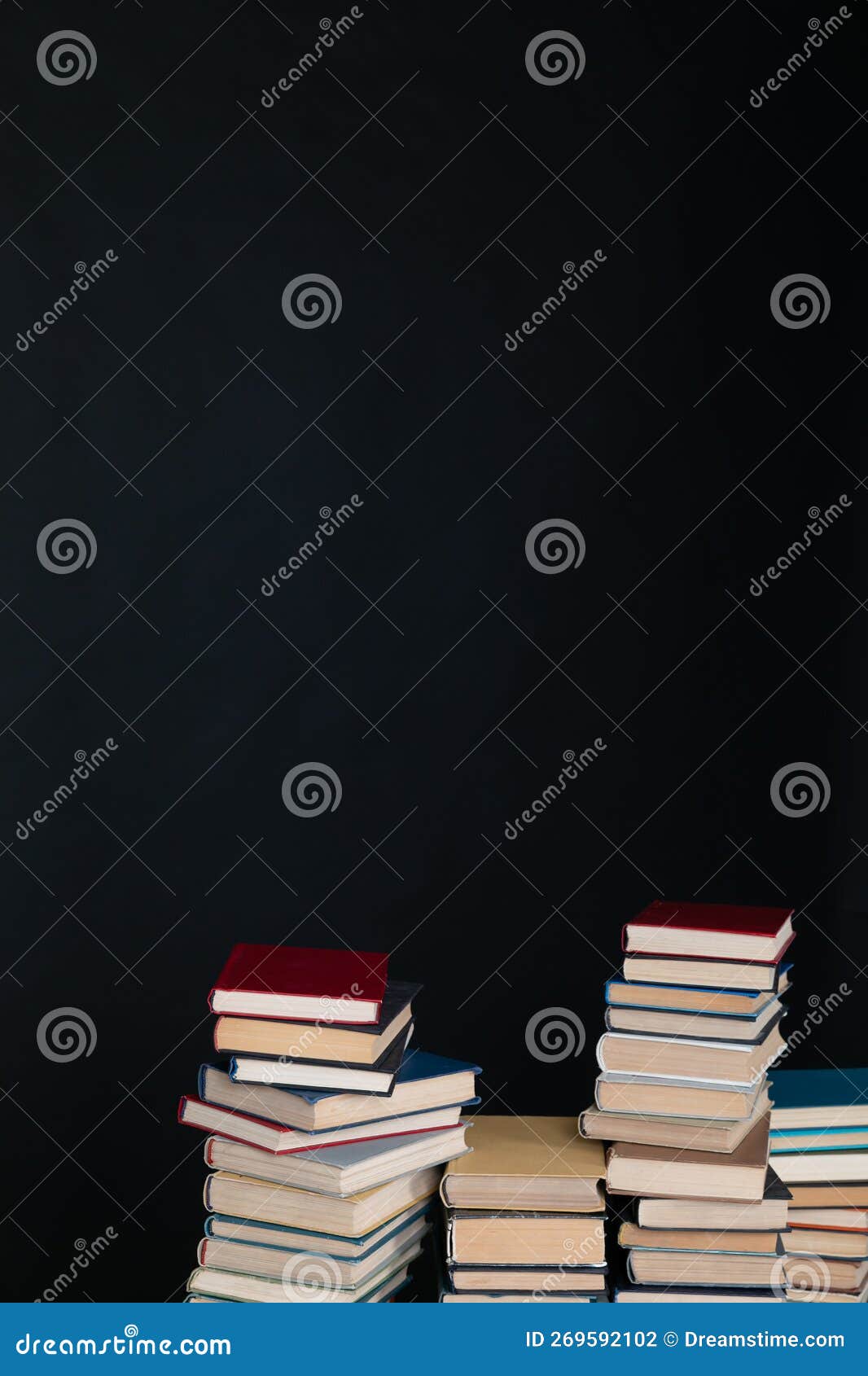 Many Books Large Stacks on the Table in the Library on a Black ...