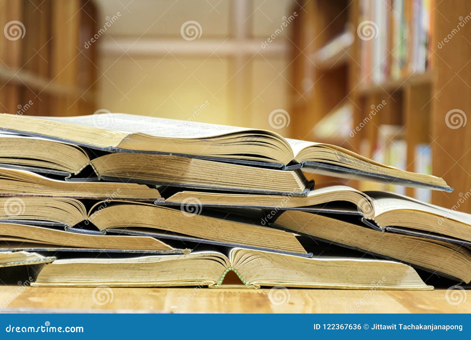 Many Books are Opened Overlapping. Put on the Table in the Libra Stock ...
