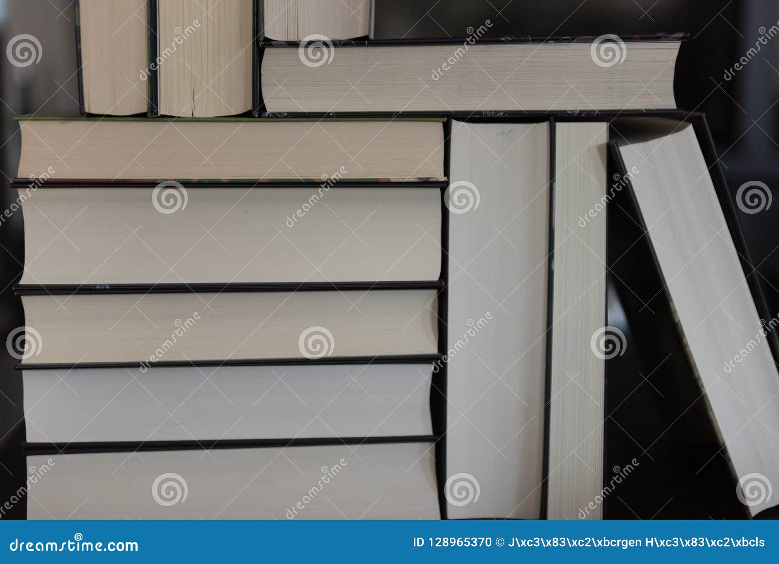 Many books piled up stock photo. Image of publisher - 128965370