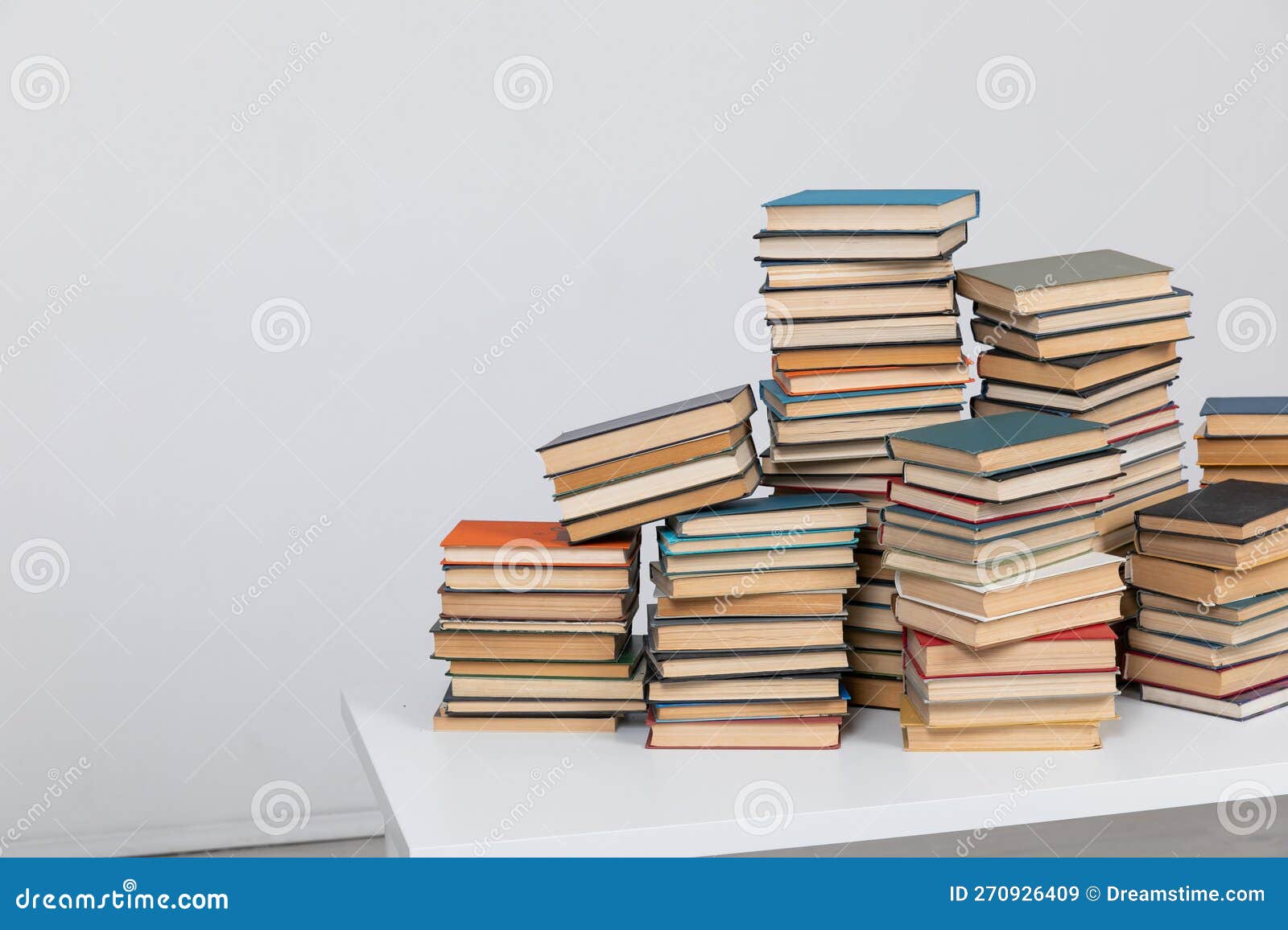 Many Books Stacked in the Library on a White Background Science ...