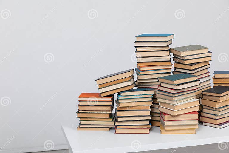 Many Books Stacked in the Library on a White Background Science ...
