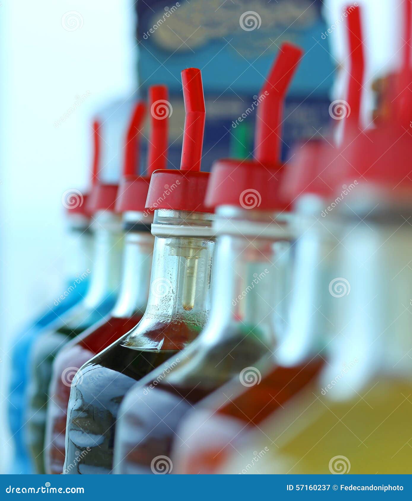 Many Bottles of Colored Syrup for Preparing Ice Creams Stock Image ...