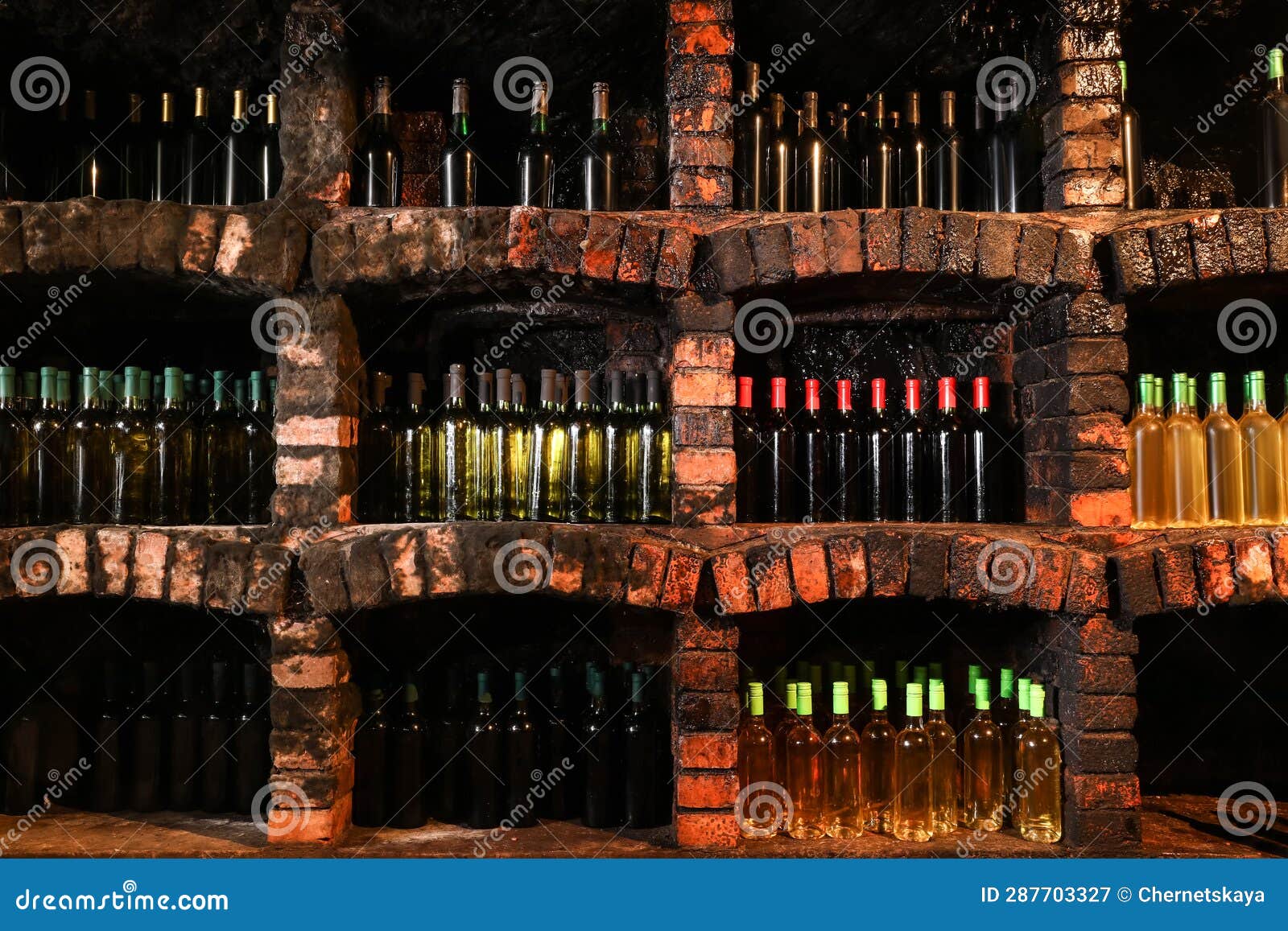 Many Bottles of Different Alcohol Drinks on Shelves in Cellar Stock ...