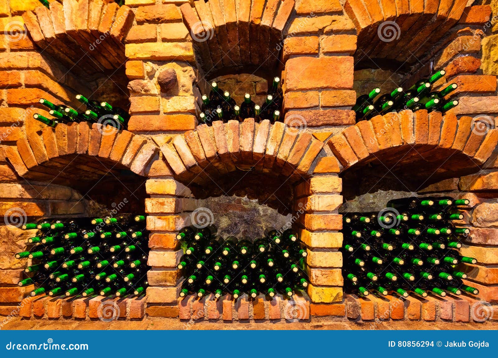 Many Bottles in Wine Cellar Stock Photo - Image of horizontal, light ...