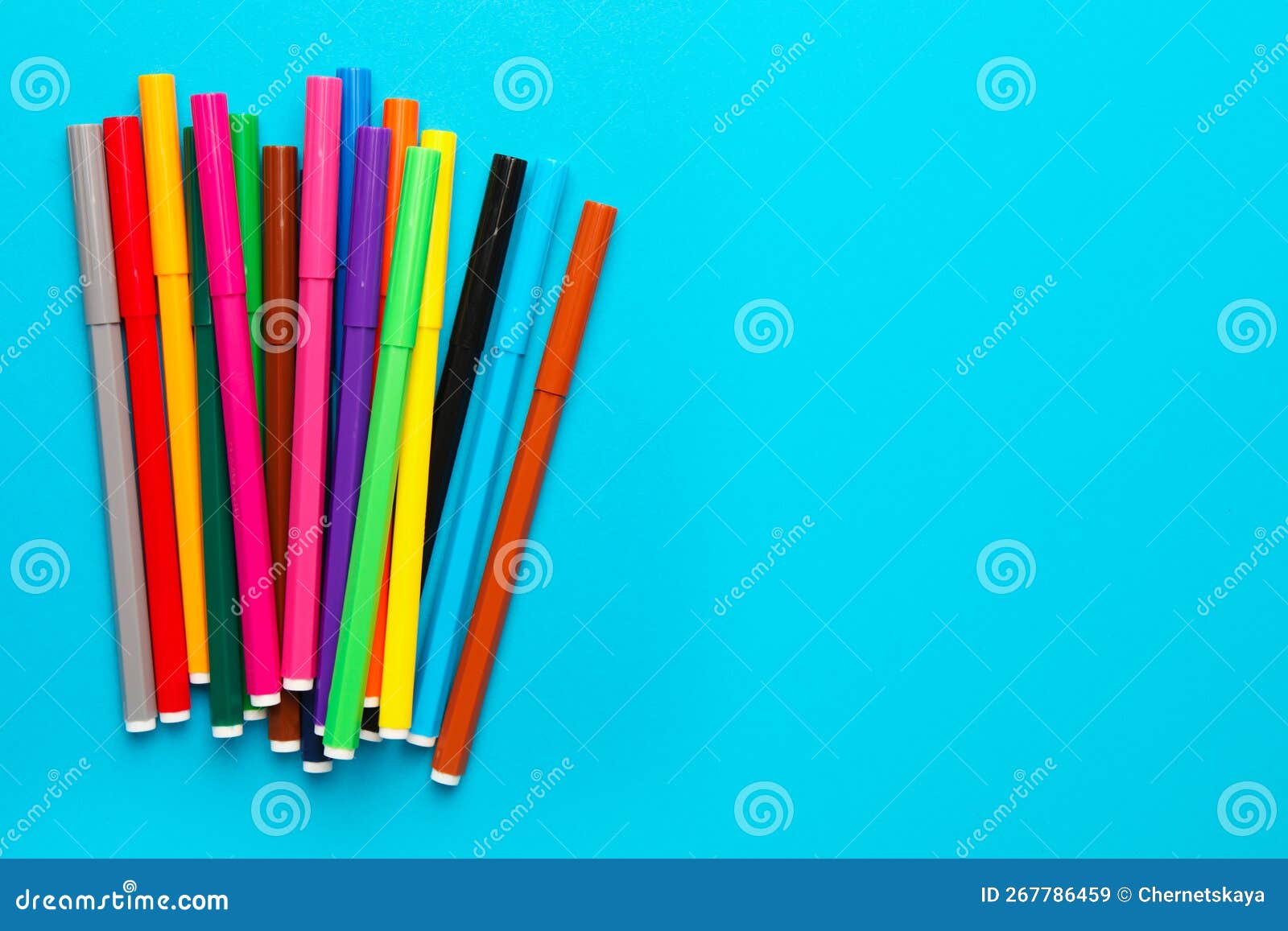 Many Bright Markers on Light Blue Background, Flat Lay. Space for Text ...