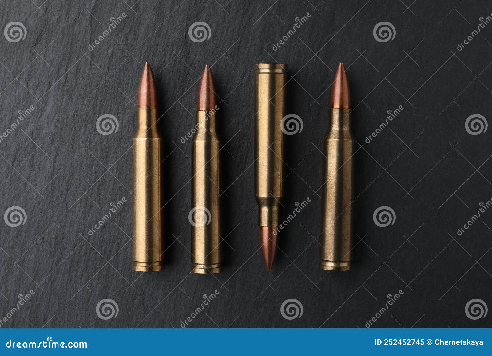 Many Bullets on Black Table, Flat Lay. Military Ammunition Stock Image ...