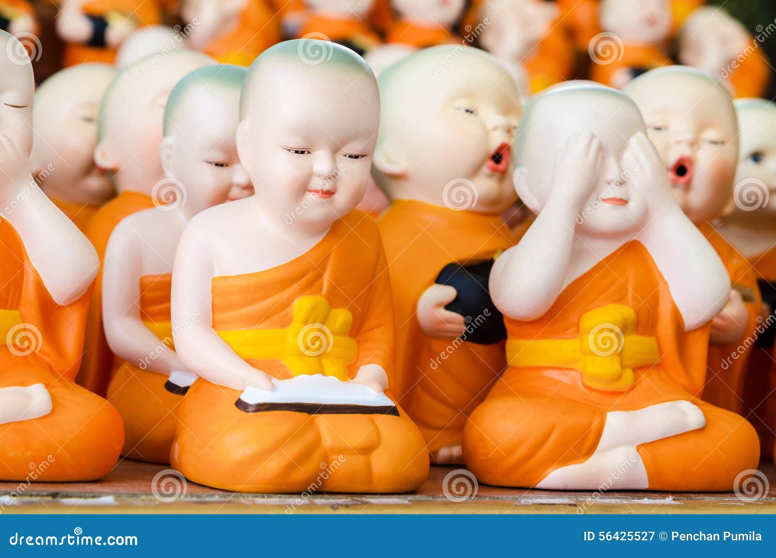 Many ceramic monk doll. stock image. Image of earthenware - 56425527