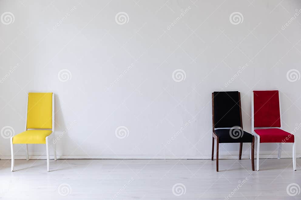 Many Chairs of Different Colors in the Interior of an Empty White Office Room Stock Photo ...