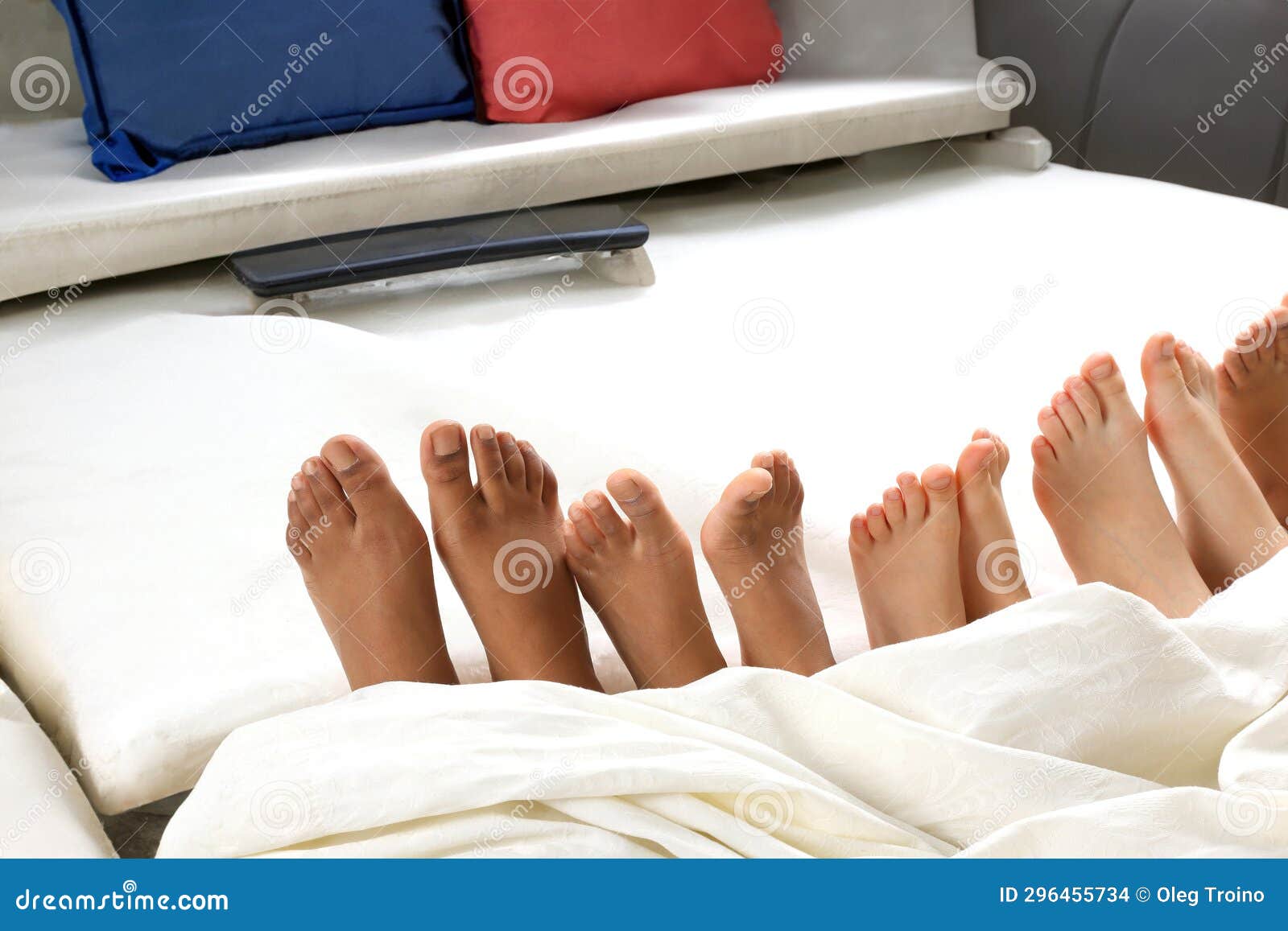 Many Children S Feet Peeking from Under the Blanket Stock Photo - Image of toes, body: 296455734