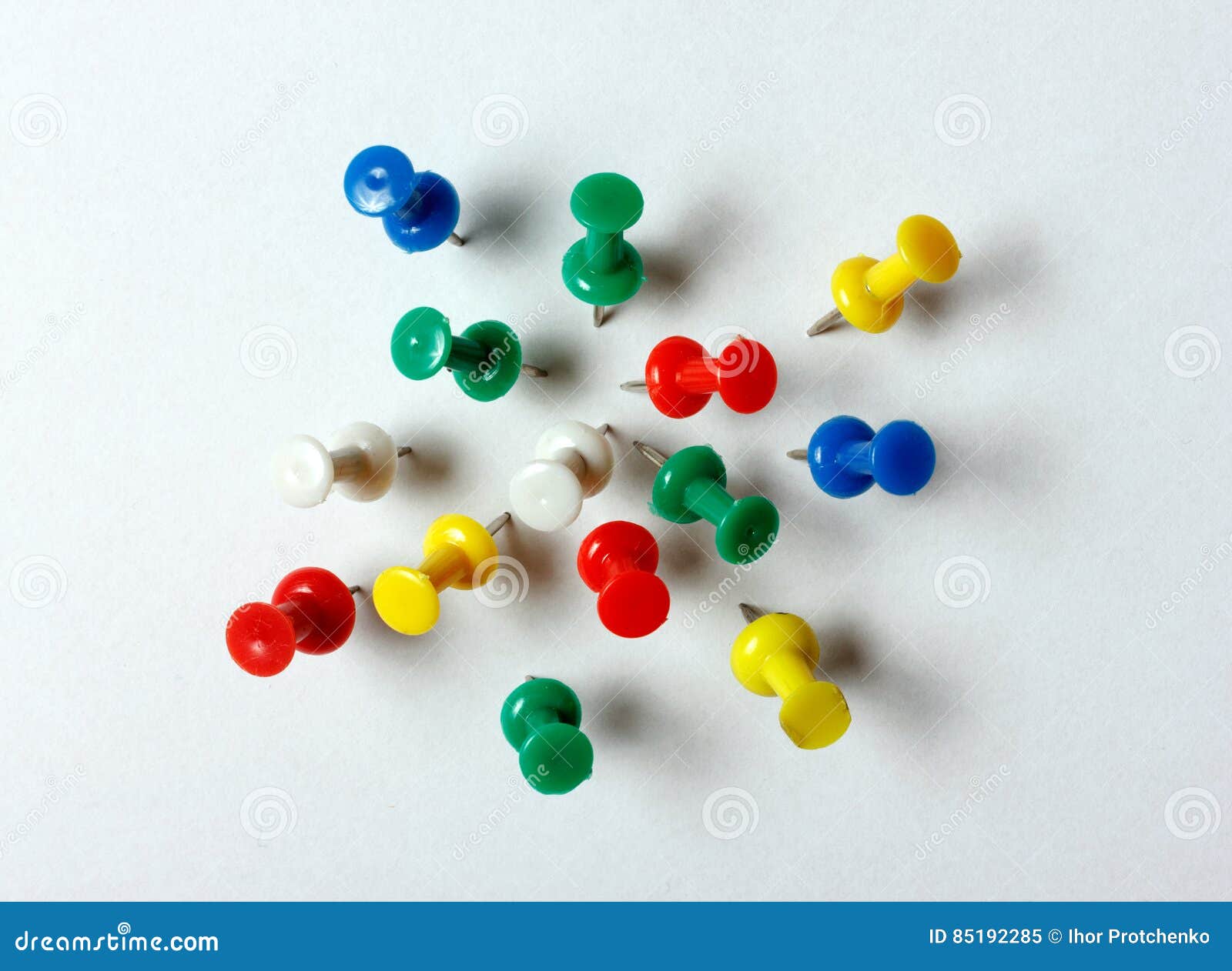 Many Colored Thumbtacks Stuck into a White Sheet Stock Image - Image of ...