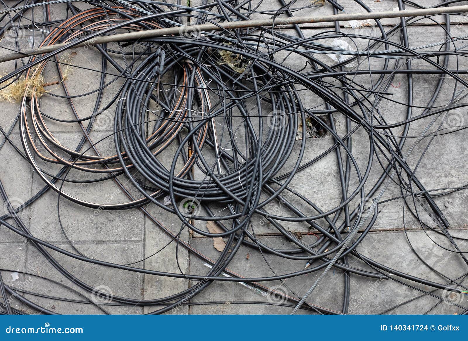 Many Confused Electrical Wires on Ground Stock Photo - Image of meshing ...