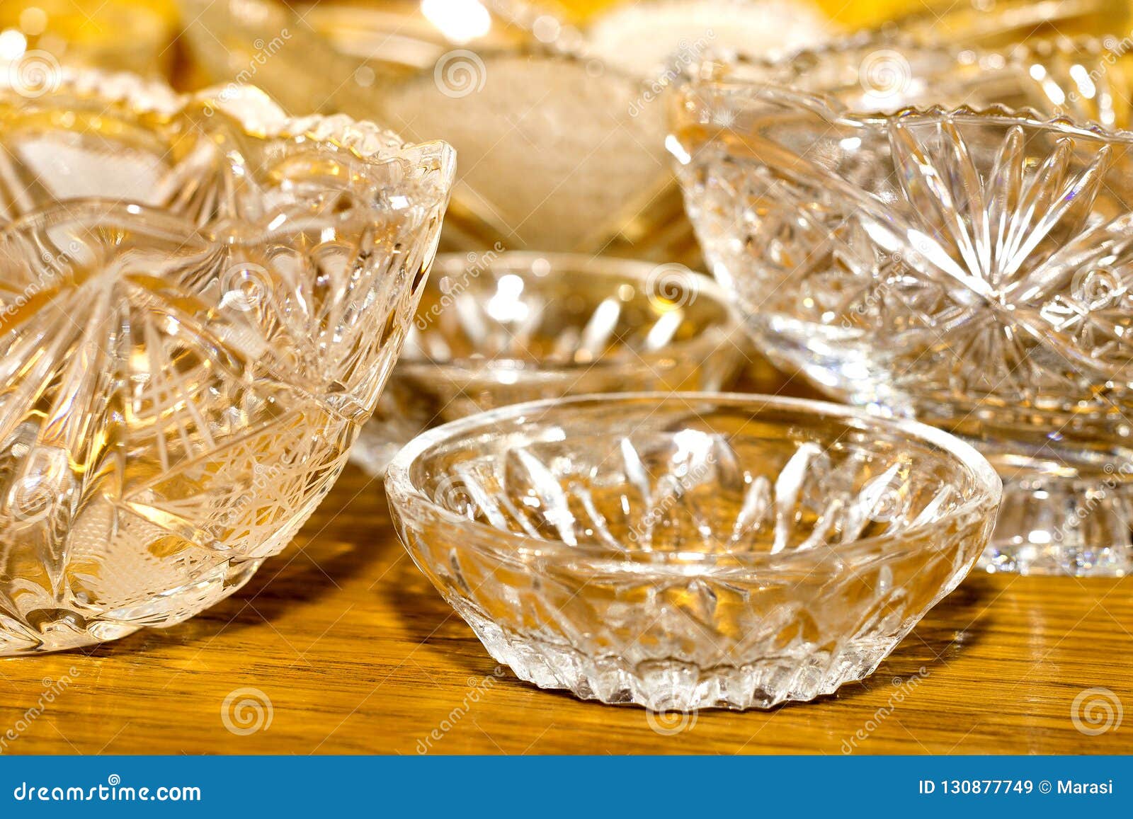 Many Crystal Items on a Wooden Table Stock Image - Image of decoration ...